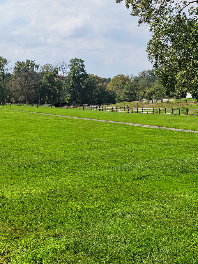 Beyond the bridge lies the pastoral landscape that defines Lancaster County&mdash;rolling fields, split-rail fences, and the promise of simpler pleasures.