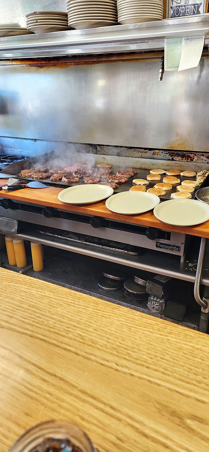 The grill &ndash; where breakfast dreams are born amid the symphonic sizzle of meat meeting heat in perfect harmony.