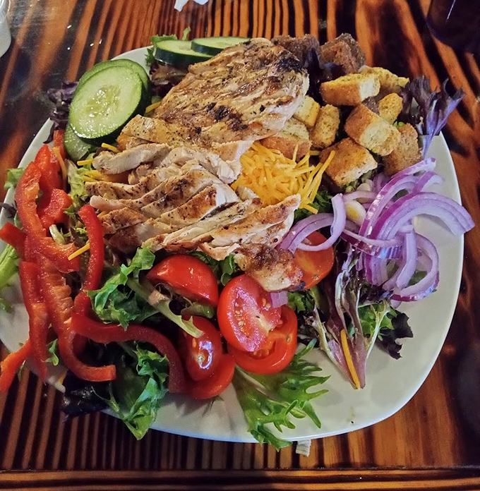 A salad that meat-lovers can embrace without reservation. Fresh, colorful, and topped with perfectly grilled chicken – this is how adults eat their vegetables.