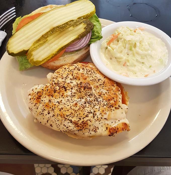 A grilled chicken sandwich that doesn't apologize for being healthy, paired with coleslaw that's found the sweet spot between creamy and crunchy.