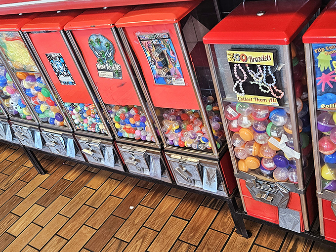 These gumball machines stand like colorful sentinels, guarding childhood memories one quarter at a time.