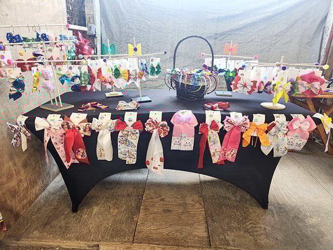 Hair bow heaven! These colorful fabric creations transform ordinary ponytails into statements of style, all neatly arranged like butterflies at rest.