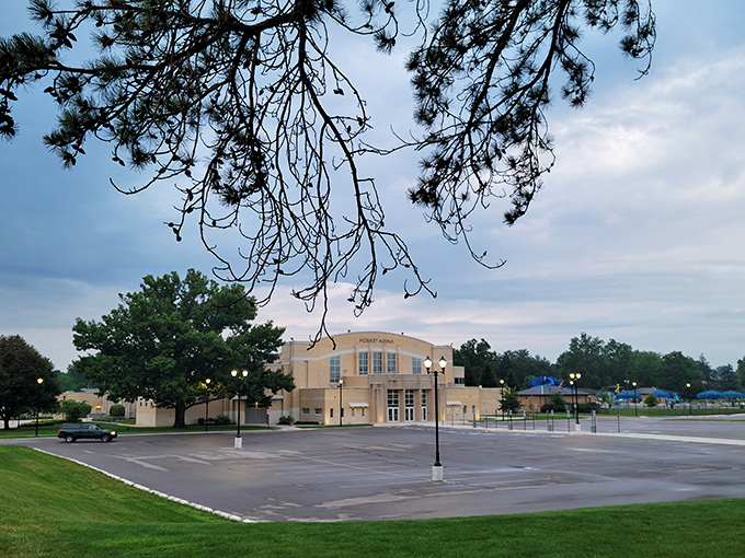 Hobart Arena waits quietly at dusk, having hosted everything from hockey games to graduation ceremonies in its community-centered space.