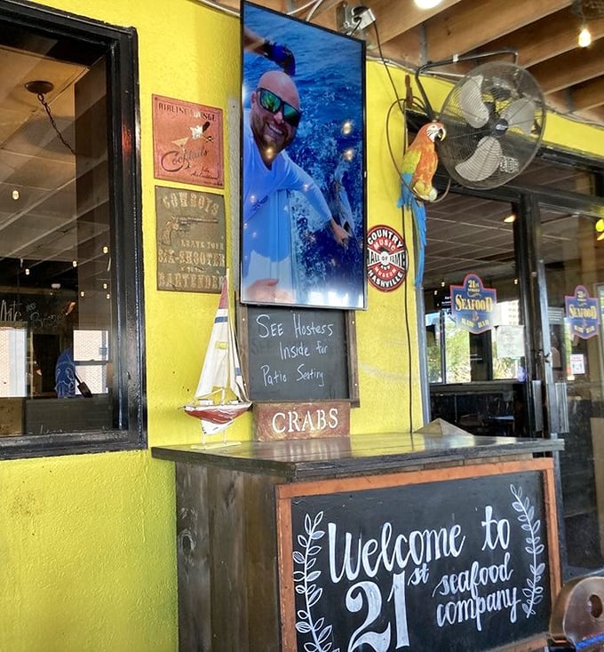 A warm welcome awaits behind this cheerful entrance, where "Home of The Hurricane" promises memorable dining adventures.