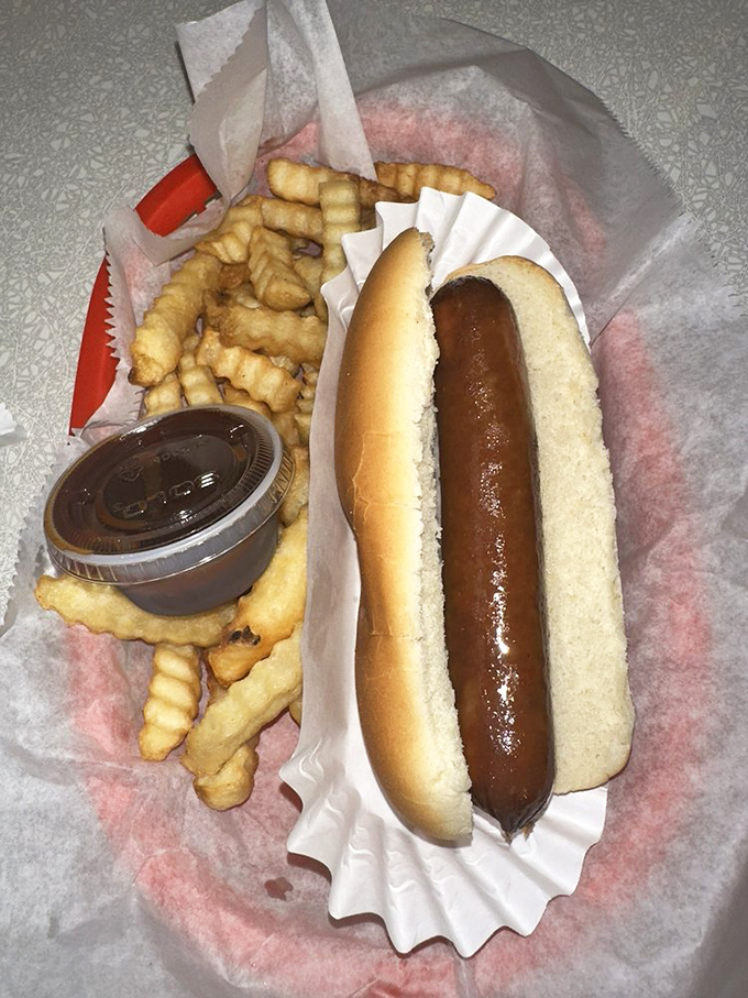 A hot dog that respects tradition&mdash;nestled in a soft bun with crinkle-cut fries that crunch like autumn leaves underfoot.