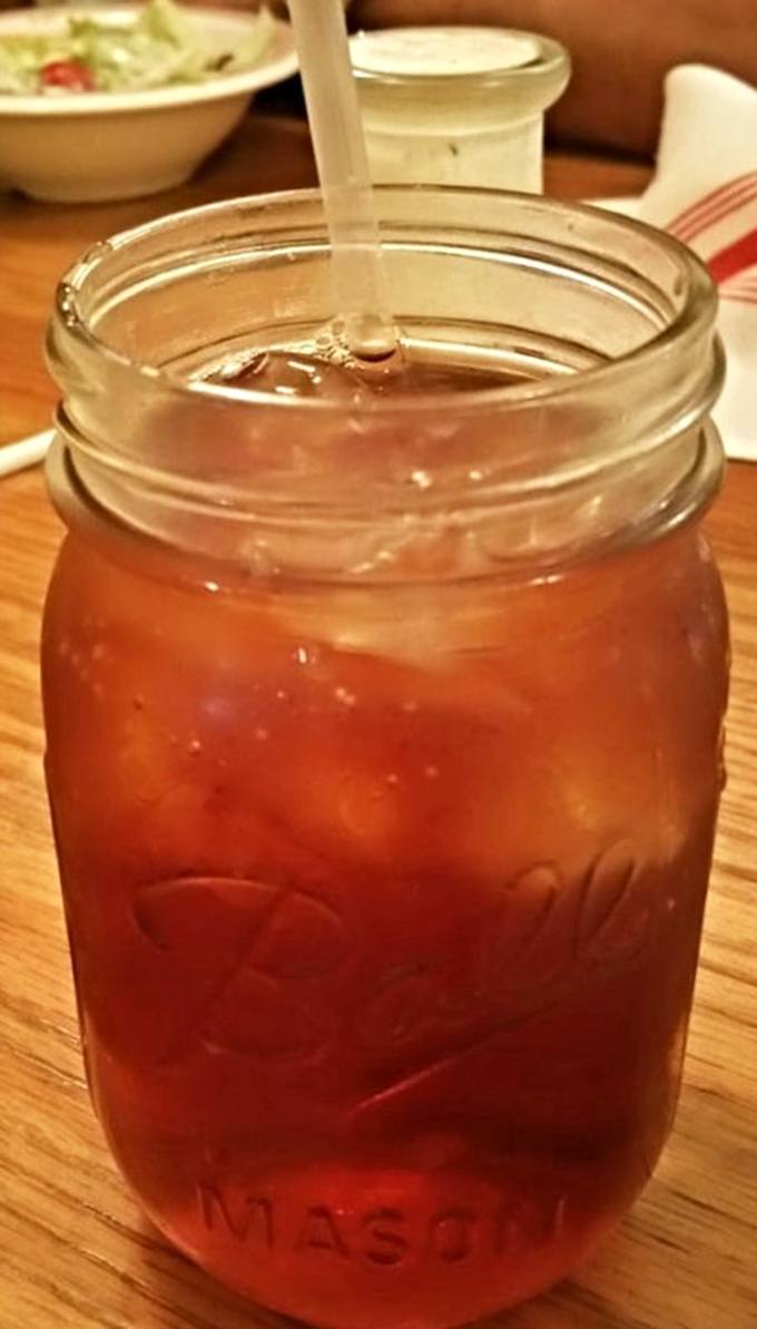 Sweet tea served in a Mason jar&mdash;because in the South, proper hydration is a matter of cultural heritage.