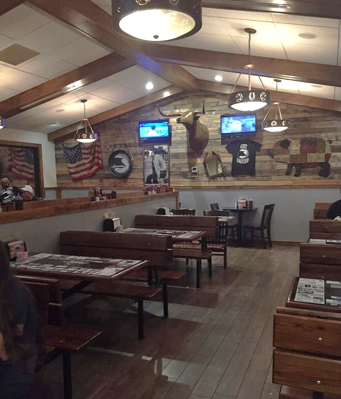 The dining room during a rare quiet moment. Those wooden booths have heard more "mmms" and "wows" than a Hollywood red carpet.