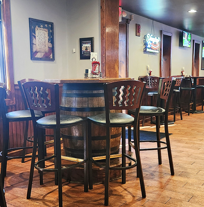 Barrel tables and wooden accents in the pub area&mdash;because great barbecue deserves a proper setting for lingering conversations and second helpings.