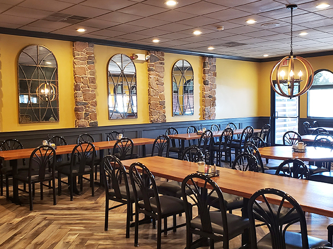 Those spherical light fixtures and stone accents give the dining room a touch of class without making you worry about using the wrong fork.
