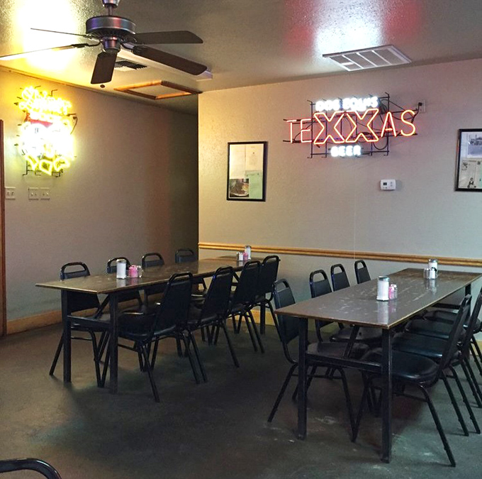 Neon Texas pride illuminates simple tables where culinary magic happens daily. No Instagram filters needed&mdash;just honest-to-goodness food.