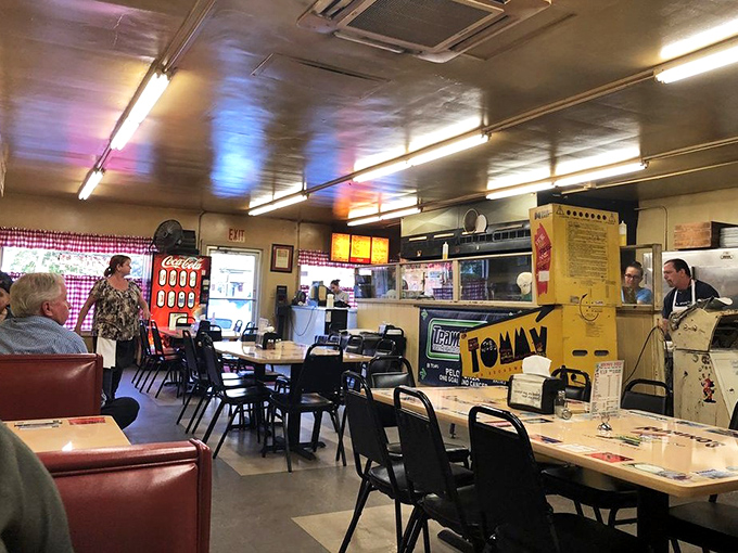 The vintage Coca-Cola machine isn't retro decor&mdash;it's a survivor from an era when dining out meant disconnecting from everything except the people at your table.