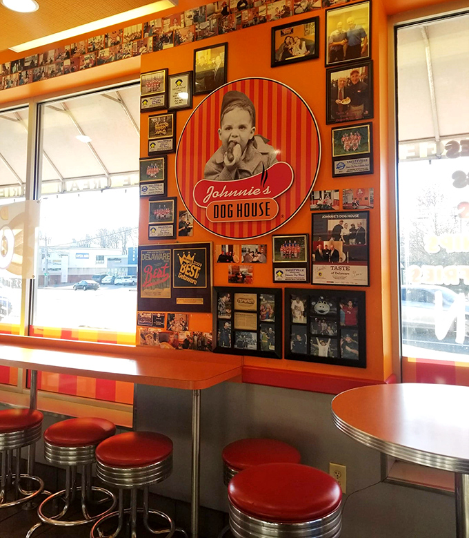 The Johnnie's logo watches over diners like a benevolent hot dog deity promising delicious protection to all who enter.