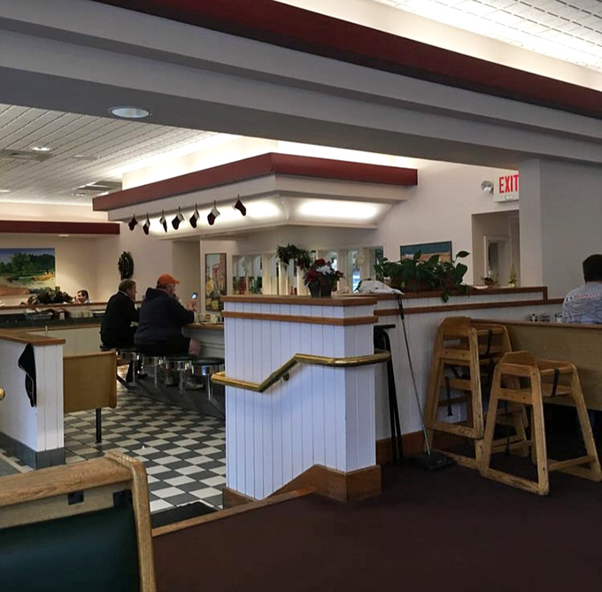 White wainscoting and warm wood tones create that perfect balance of comfort and cleanliness. Breakfast with a side of nostalgia, hold the pretension.