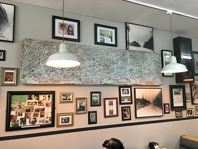 The wall of memories tells stories of Erie's past while diners create new ones. That signature board covered in signatures speaks volumes.