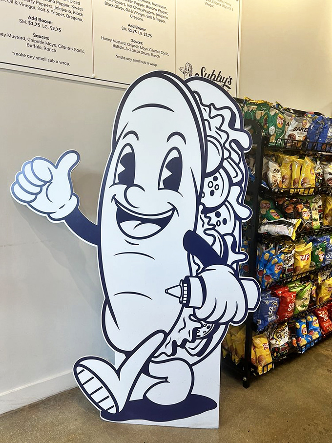 The sandwich mascot stands guard like a delicious sentinel. His thumbs-up is both a greeting and a quality guarantee.