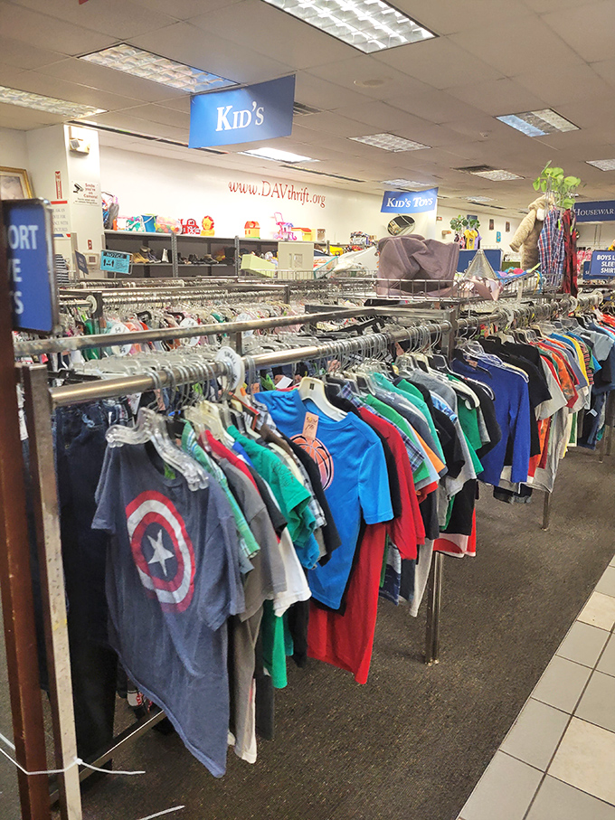 The kids' section, where Captain America t-shirts find second lives. These clothes have plenty of playground adventures still in them.