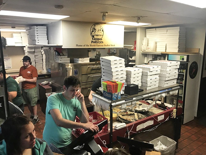 Behind the scenes where the magic happens&mdash;a bustling kitchen cranking out those famous breadsticks that have fueled countless college memories.
