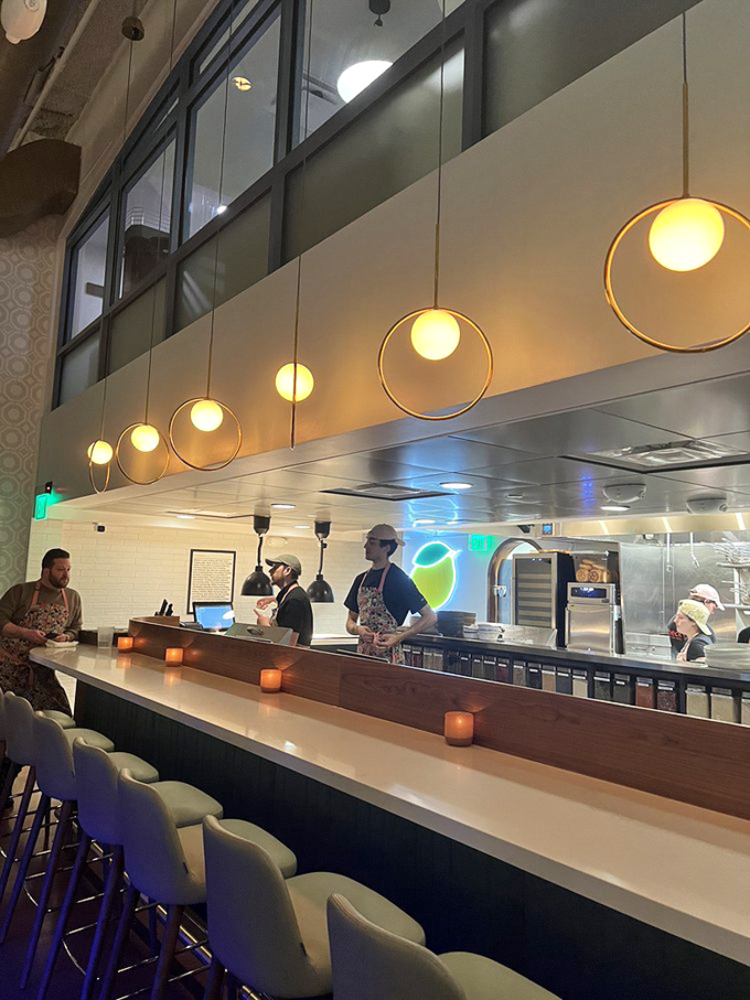 Where culinary magic happens in full view. The open kitchen concept invites diners into the process, turning dinner into dinner and a show.