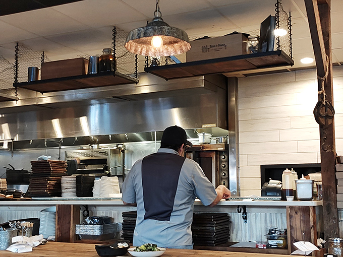 Where culinary magic happens. The open kitchen concept lets you witness the choreography of cooking &ndash; dinner and a show without the cheesy tableside flamb&eacute;.