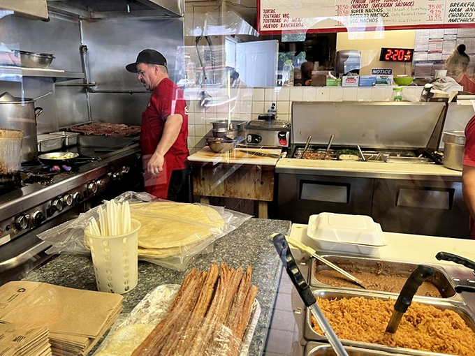 Behind every great burrito is a kitchen ballet of practiced hands. This is where the magic happens, one tortilla at a time.