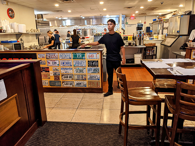 License plates from New England states decorate the kitchen entrance&mdash;a visual reminder that homesickness can be cured with the right recipe.