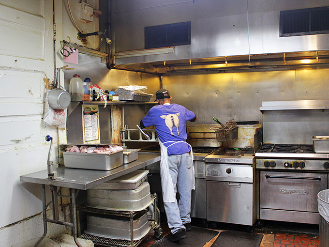 Where the magic happens behind the scenes. This no-frills kitchen proves great barbecue comes from skill and patience, not fancy equipment.