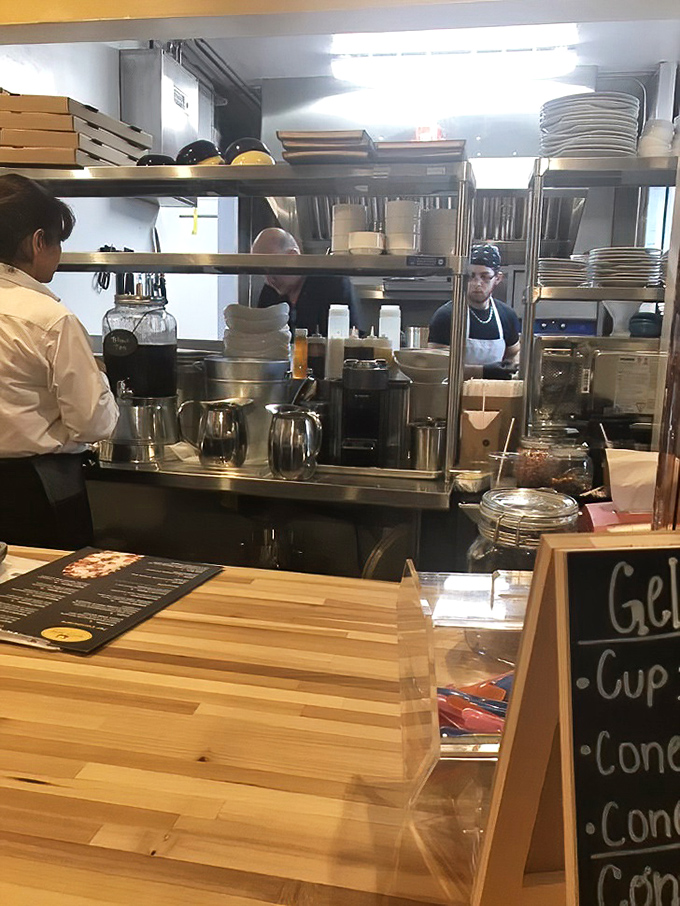 Where the magic happens! Molto Bene's kitchen team orchestrates culinary symphonies behind the scenes, turning simple ingredients into edible art.