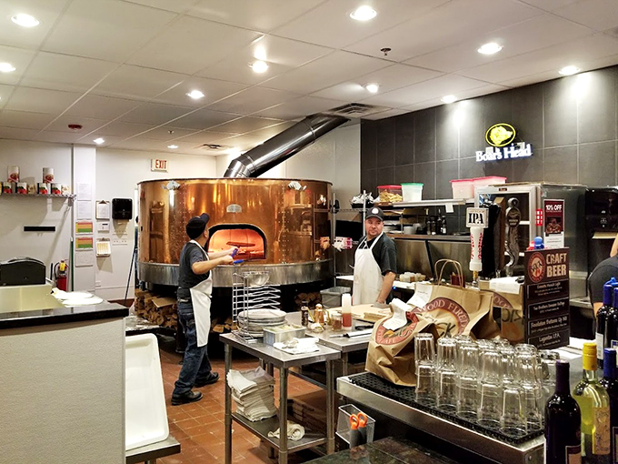 The open kitchen concept isn't just for show&mdash;it's dinner and a performance, with dough-tossing skills that would make circus jugglers jealous.