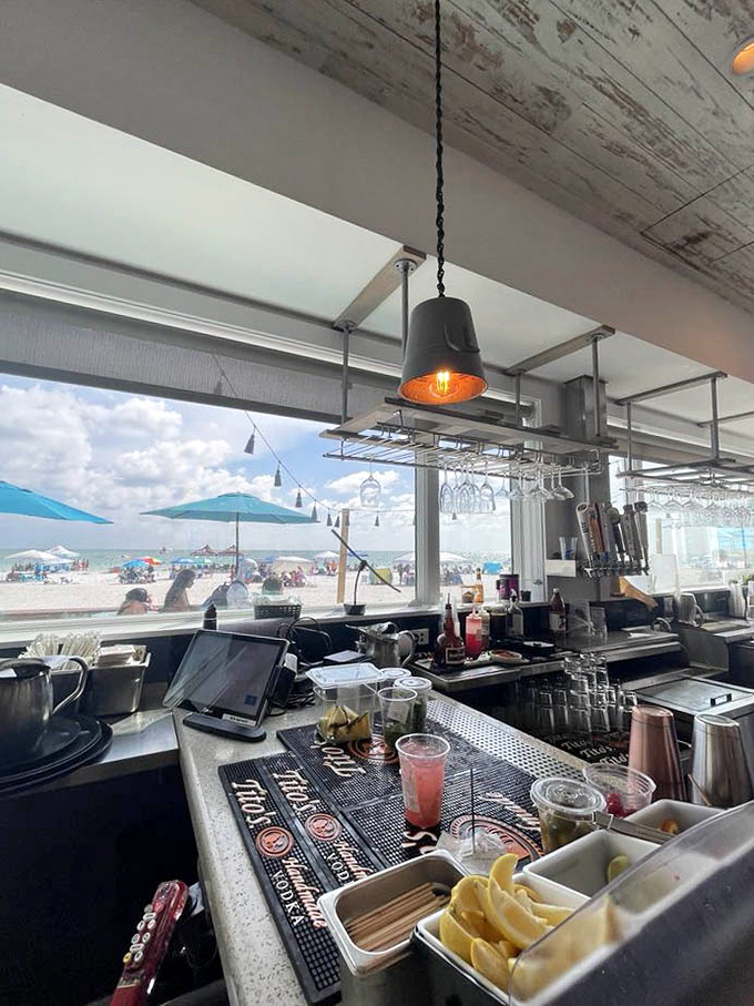 Where the magic happens, with a side of beach view. Some people have office windows; these lucky chefs have paradise.