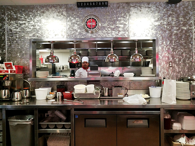 The open kitchen design lets you witness culinary craftsmanship in action&mdash;where short-order cooking becomes an art form worthy of your full attention.