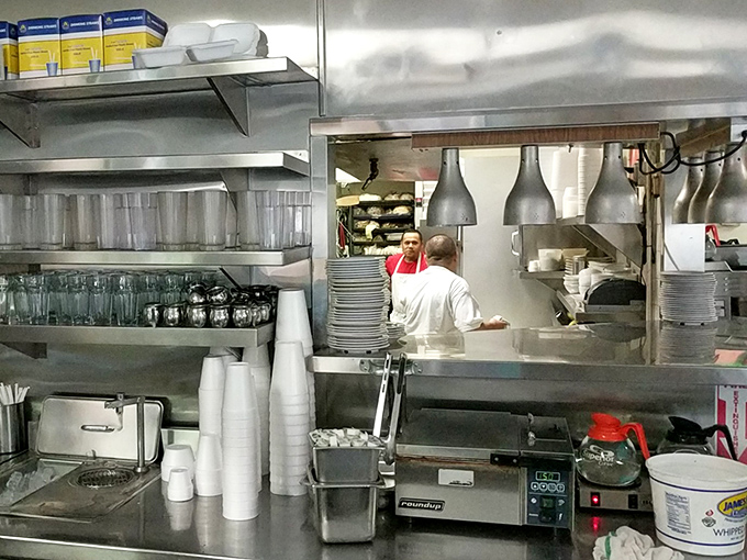 Behind the scenes, where the griddle symphony plays its greatest hits all morning long.