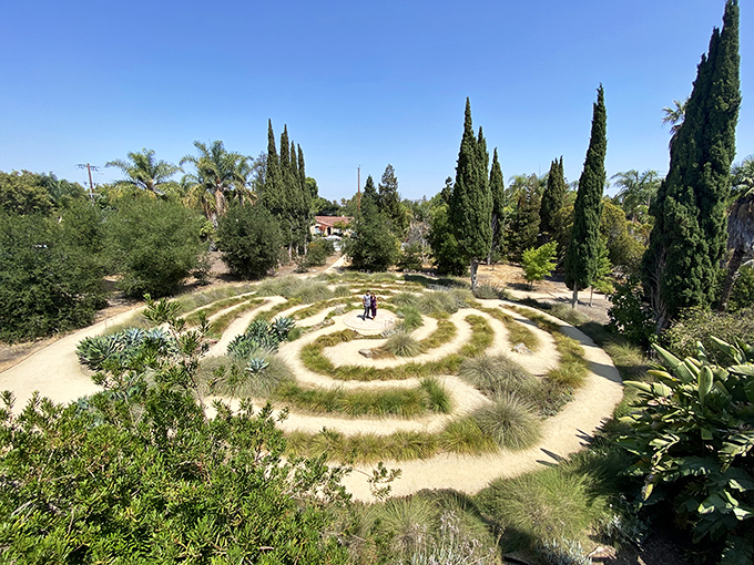 The labyrinth invites contemplative walking among cypress trees. Getting lost has never been so intentional&mdash;or so spiritually rewarding.