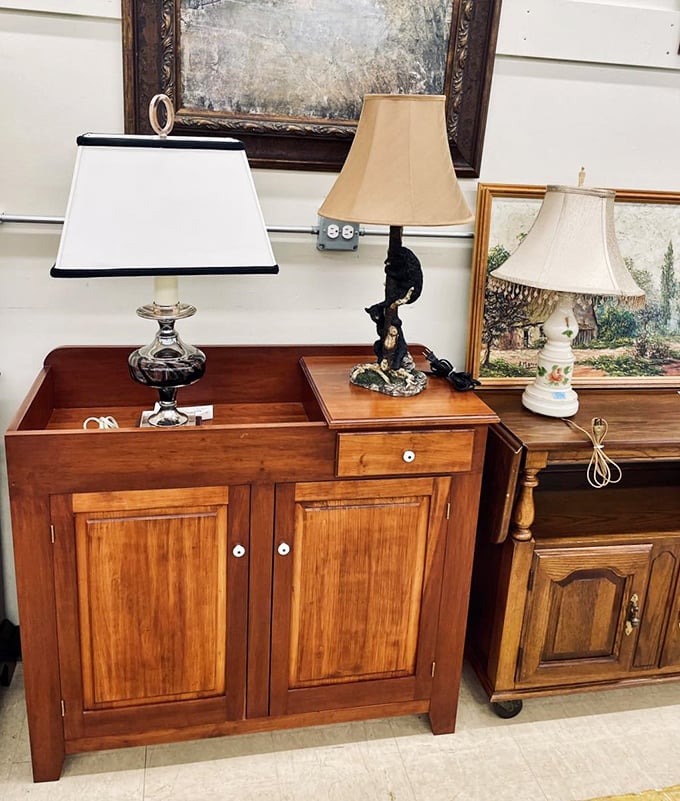 Lamp department illuminating possibilities! These wooden cabinets and lighting fixtures are ready to brighten someone's day&mdash;and living room.
