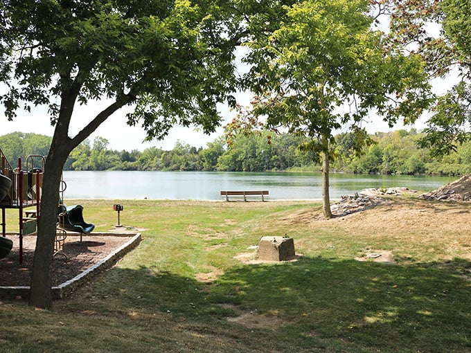 Quiet park benches facing calm waters&mdash;nature's version of therapy that doesn't require filling out insurance paperwork.