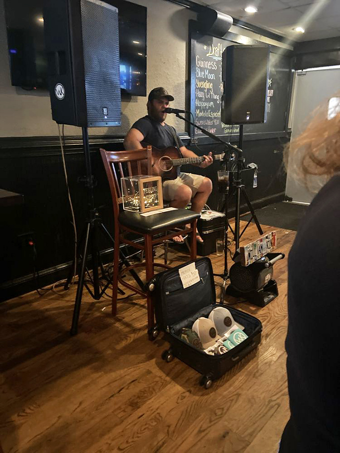 Live music transforms dinner into an experience. This guy's guitar has probably heard more food moans than most restaurant critics.