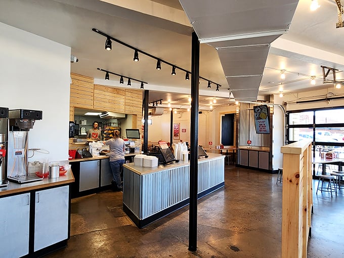 Concrete floors and wooden accents create the perfect backdrop for chicken appreciation. No distractions here&mdash;just you and your impending flavor journey.
