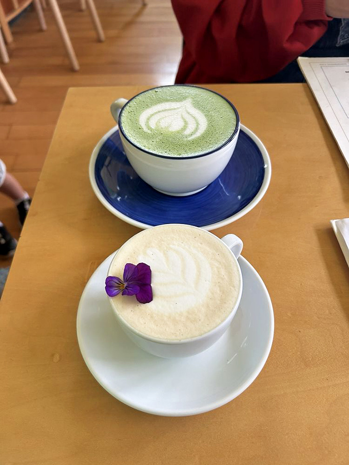 These aren't just beverages&mdash;they're works of art. The matcha's emerald swirl and the latte's delicate flower garnish elevate morning caffeine to ceremony.