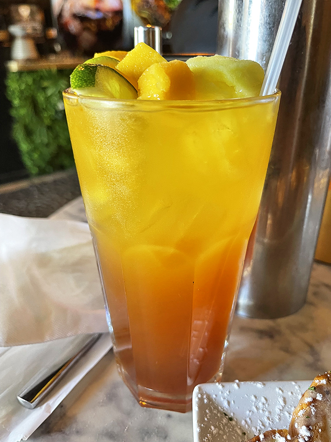 This mango tea gradient looks like a Florida sunset in a glass. Hydration has never been so photogenic.