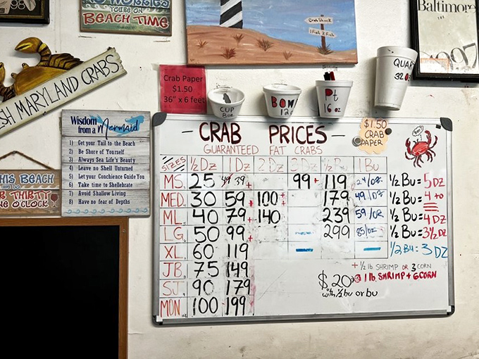 The whiteboard of destiny! These handwritten prices reflect the day's catch&mdash;a true sign you're getting the freshest seafood possible.