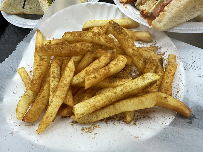 French fries dusted with aromatic spices turn a familiar favorite into an exciting culinary adventure.
