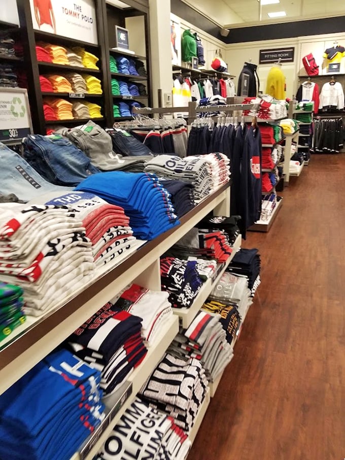 Tommy Polo's rainbow of neatly folded shirts promises a wardrobe upgrade that won't require explaining mysterious charges to your significant other.