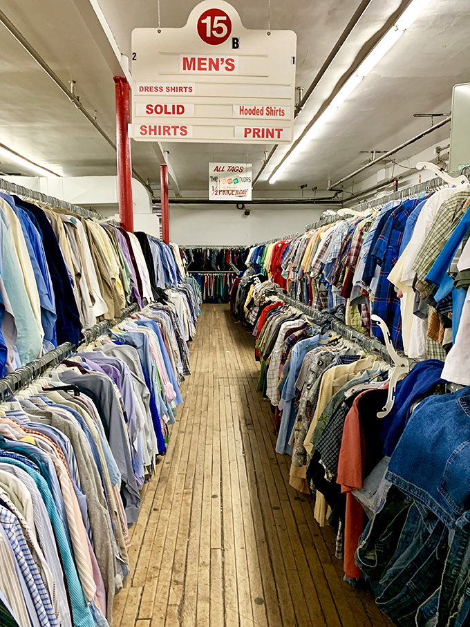 Men's shirts stretch into the horizon, a kaleidoscope of patterns and possibilities. Business casual meets vintage cool in this sartorial smorgasbord.