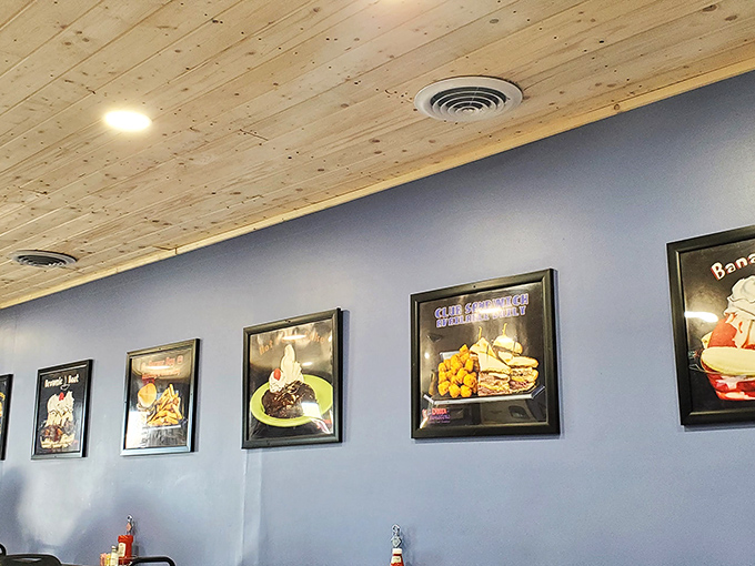 The wall of framed dessert photos serves as both decoration and a visual menu that makes decision-making deliciously difficult.