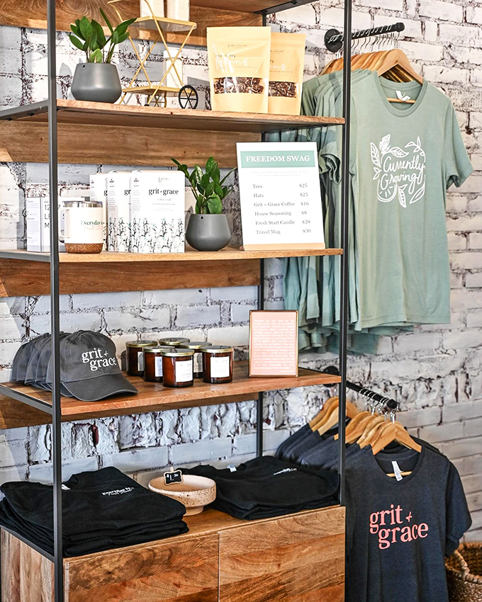 The merch corner says "take a piece of this place home with you" without being pushy about it&mdash;like a good friend offering leftovers.