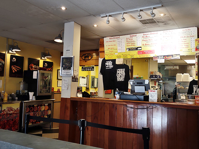The ordering counter: where dreams are placed and smoky reality is returned. Those t-shirts are the badges of barbecue devotion.