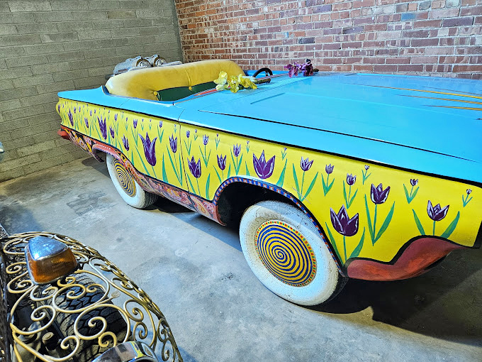 Bright yellow blooms transform this vehicle into a rolling garden that brings springtime joy year-round to viewers. 