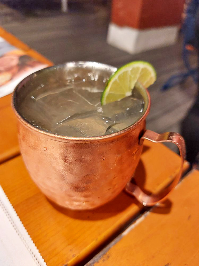 The Moscow Mule's German cousin arrives in a copper mug, lime perched jauntily on the rim – refreshment that cuts through rich Bavarian fare.