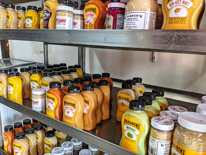 The mustard shelf isn't just condiments&mdash;it's a color palette of tangy possibilities, each bottle promising to elevate your kielbasa experience.