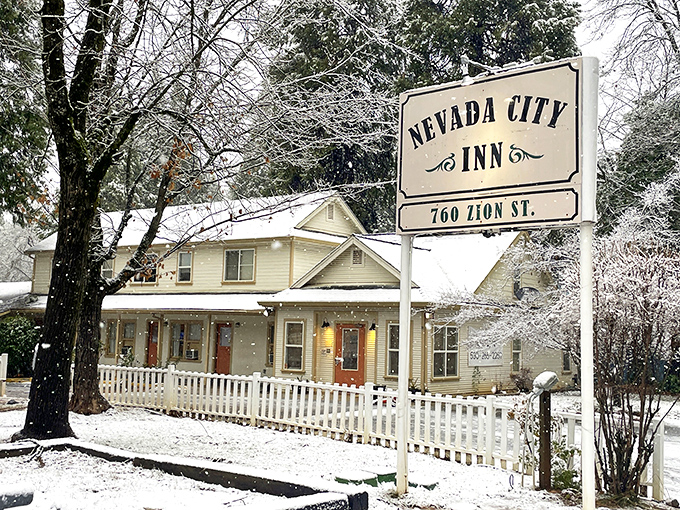 Winter transforms the Nevada City Inn into a snow globe come to life. This cozy retreat proves that some places actually look better with a dusting of powder.