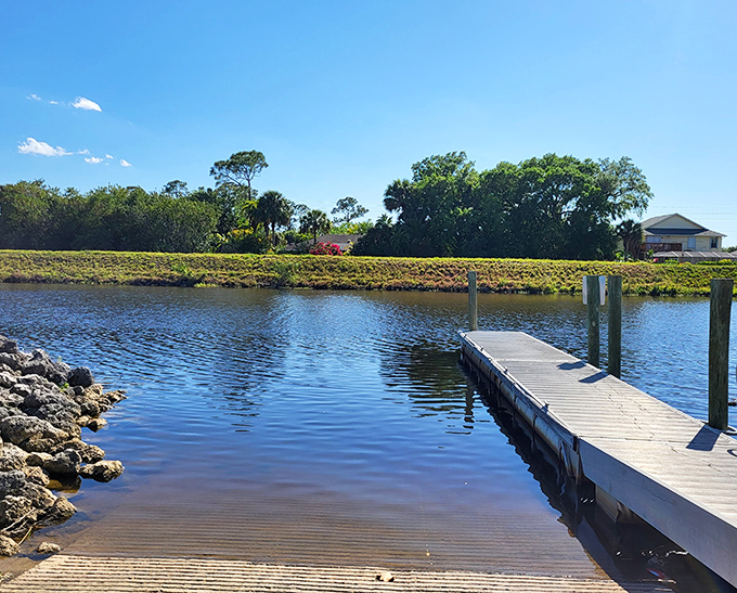A simple dock extending into calm waters captures the essence of Florida living. This quiet moment of reflection comes standard with Port St. Lucie's waterfront access points.
